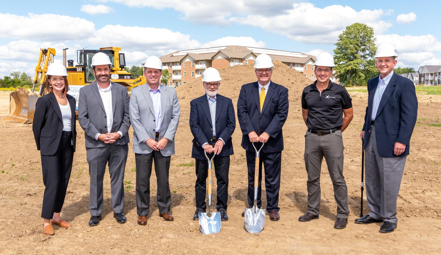 Direction Home executives, board members, and local officials “turn the ...